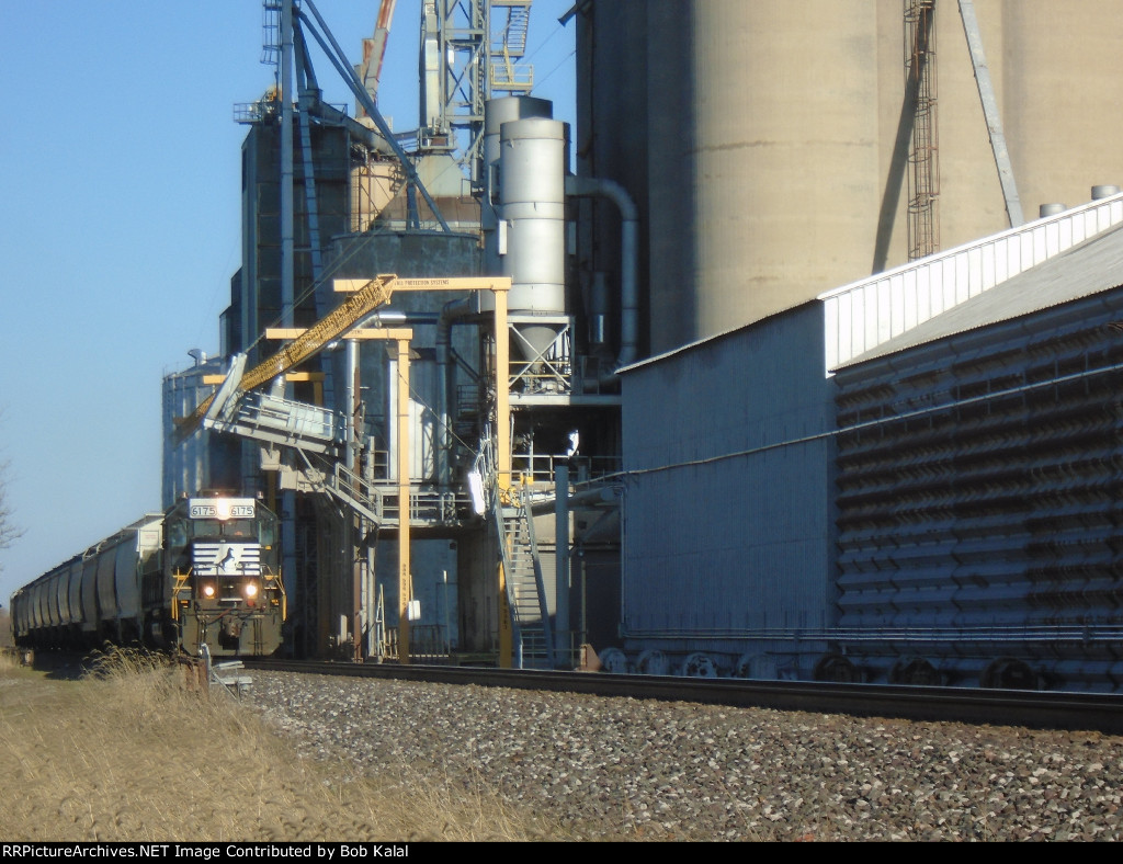 NS 6175 heads west on Main Line passing elevator